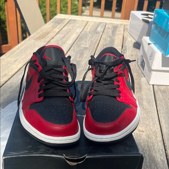 Nike | Shoes | Air Jordan Low Red And Black Almost Brand New | Poshmark